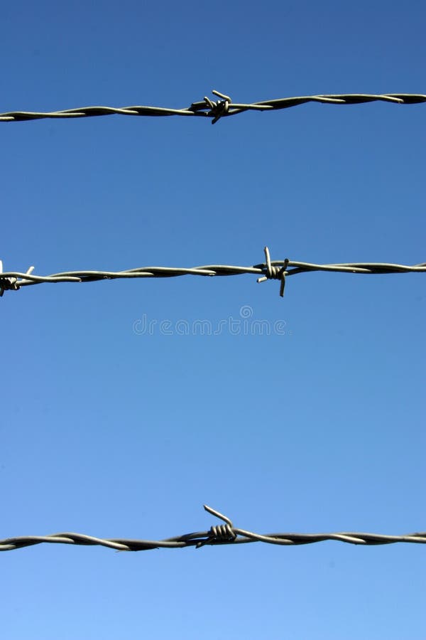 Three Strands of Barbed Wire. Stock Photo - Image of snag, triple: 86212