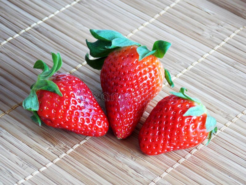 Three strawberries stock image. Image of fruit, pile - 53023019