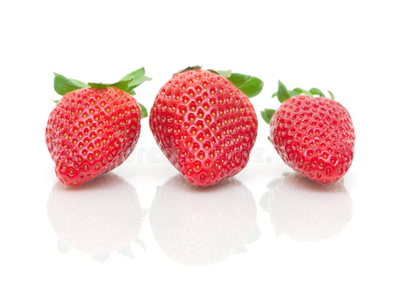 Three Strawberries on a White Background Close-up Stock Image - Image ...