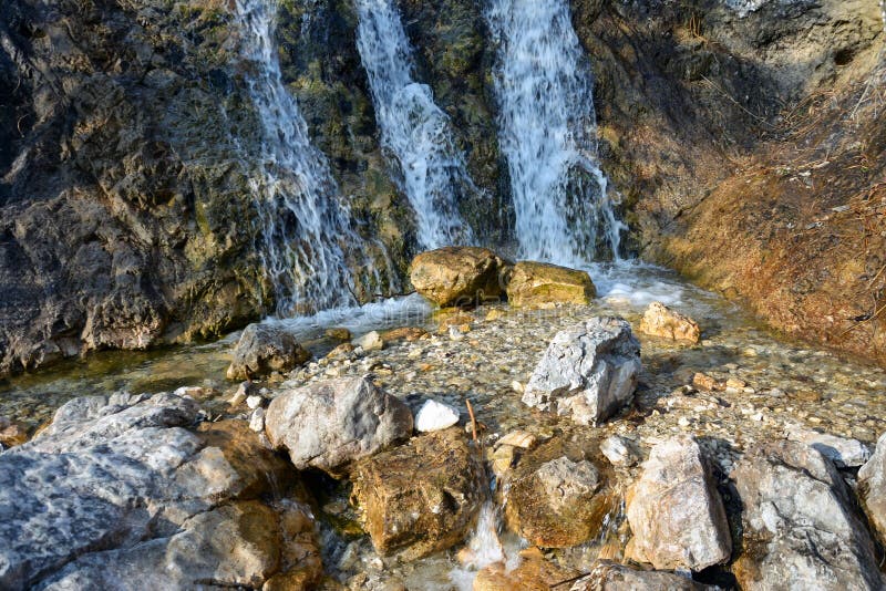 The Flow of a Small Waterfall on the Rock Flows Over the Stones ...