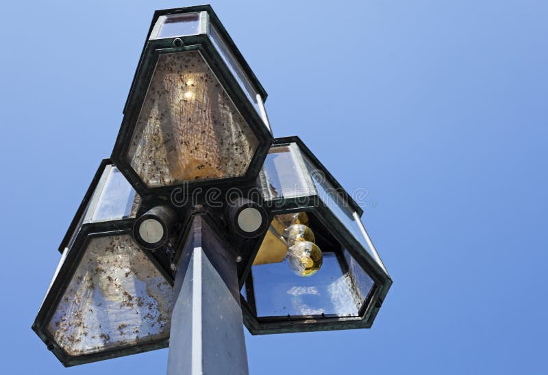 Three Street Lamps Forming a Triangle Stock Photo - Image of broken ...
