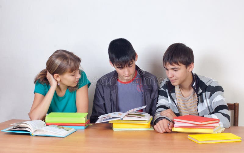 Three students with books stock image. Image of book - 17841067