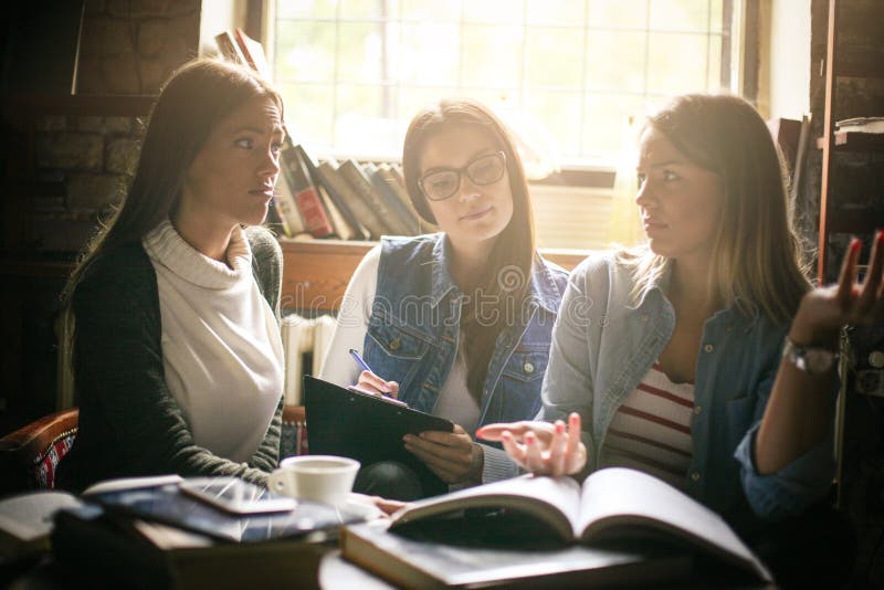 Three Students Girl Learning Together and Using Smart P Stock Photo ...