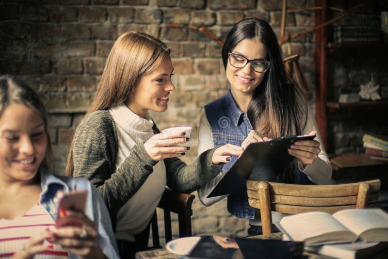 Three Students Girls in Cafe. Stock Photo - Image of indoor, home ...