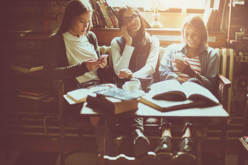 Three Students Happy Girls Teaching in Cafe. Stock Photo - Image of ...