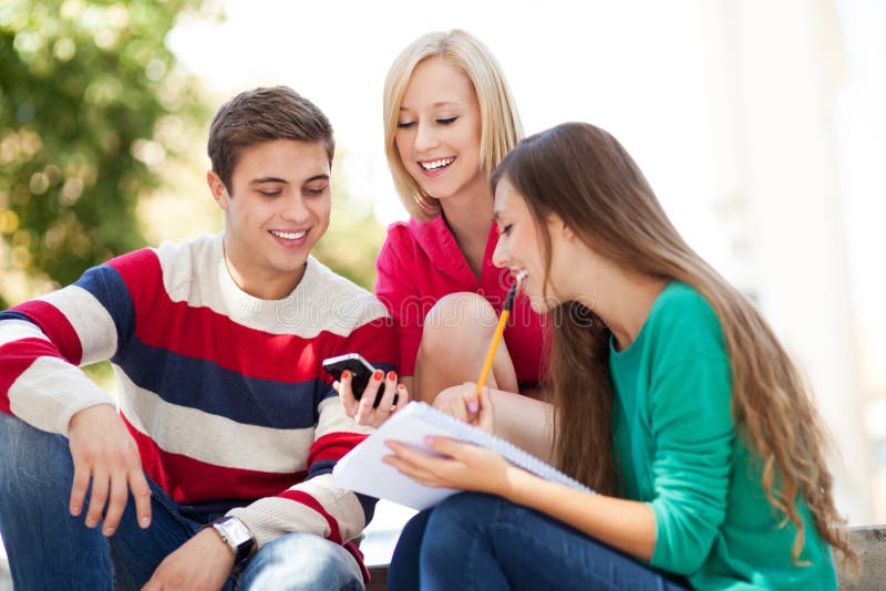Three Students Sitting Together Stock Image - Image of girls, smiling ...