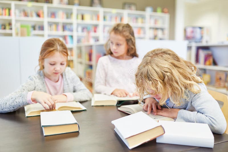 Three Students in a Study Group Stock Photo - Image of diligent ...