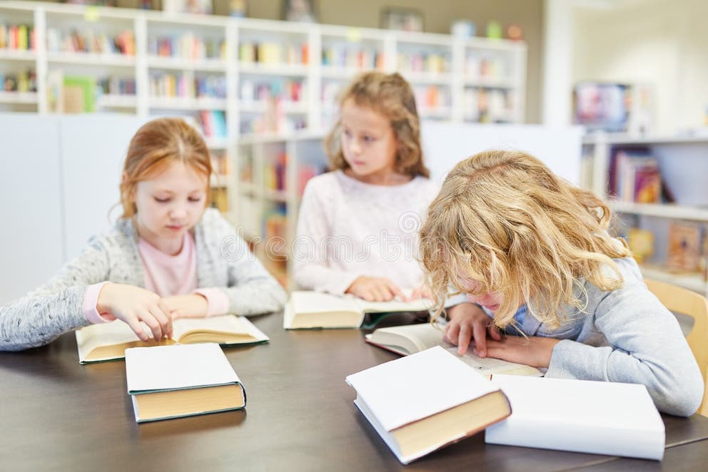 Three Students in a Study Group Stock Photo - Image of diligent ...