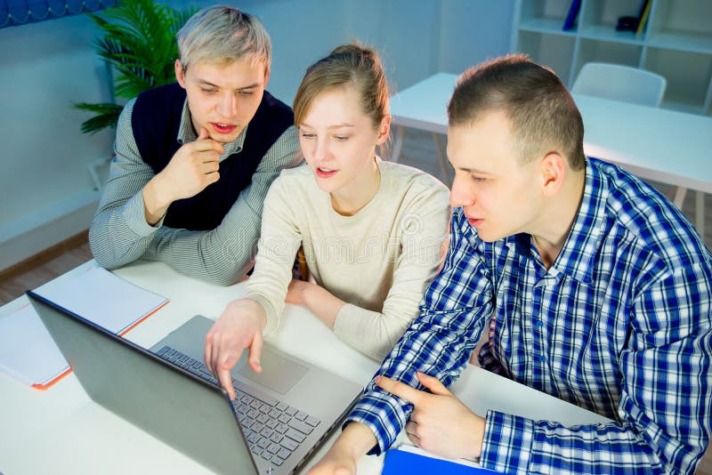 Three Students Work Together Stock Photo - Image of screen, office ...