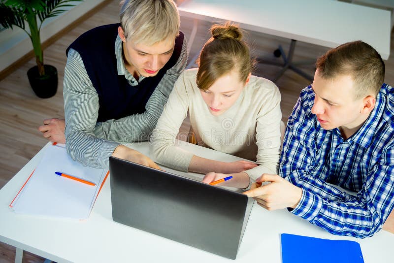 Three Students Work Together Stock Photo - Image of teamwork ...