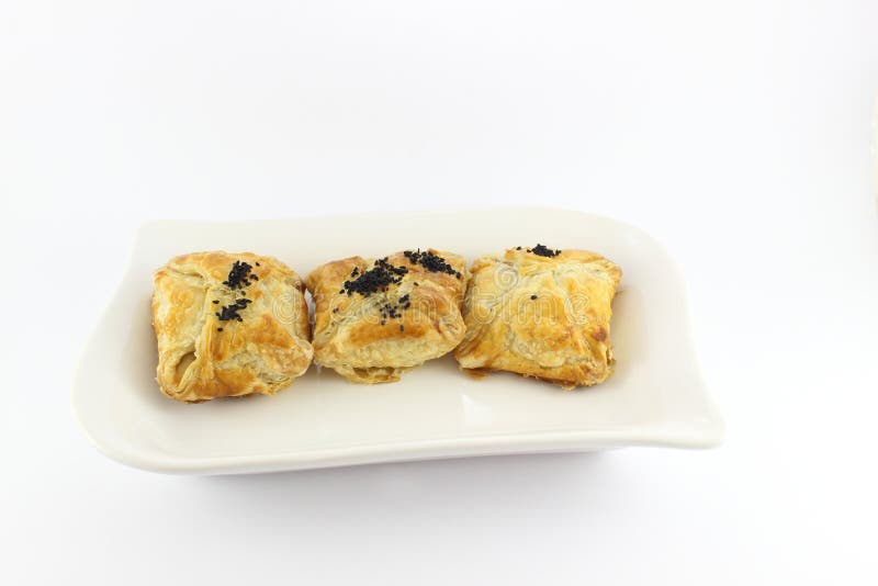 Three Stuffed Pastries stock photo. Image of porcelain - 42554578