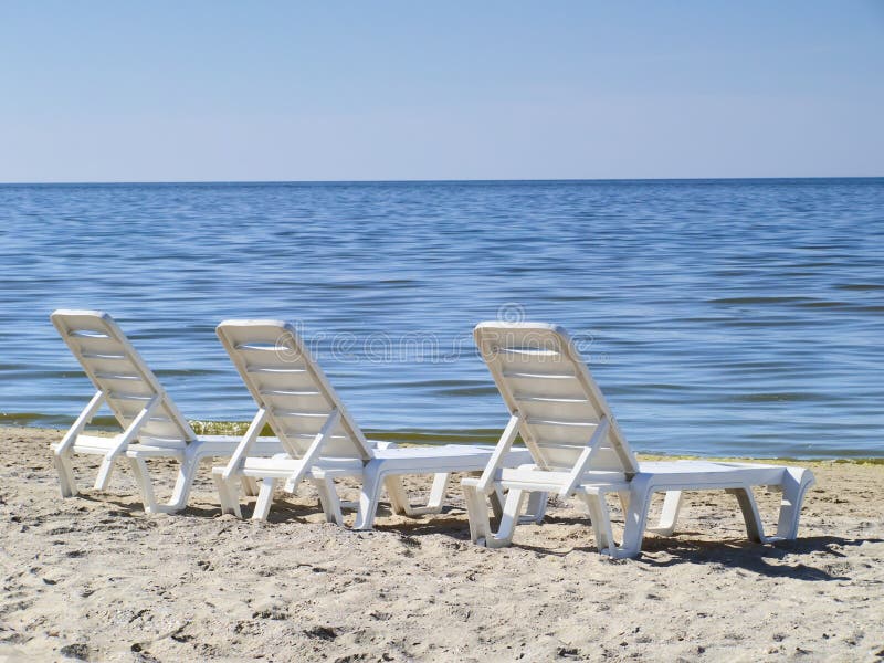 Three Sun Loungers on a Deserted Beach Stock Image - Image of paradise ...