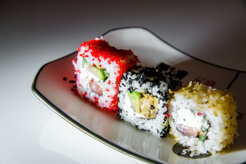 Three Sushi on a White Plate Stock Photo - Image of wasabi, rice: 89304052