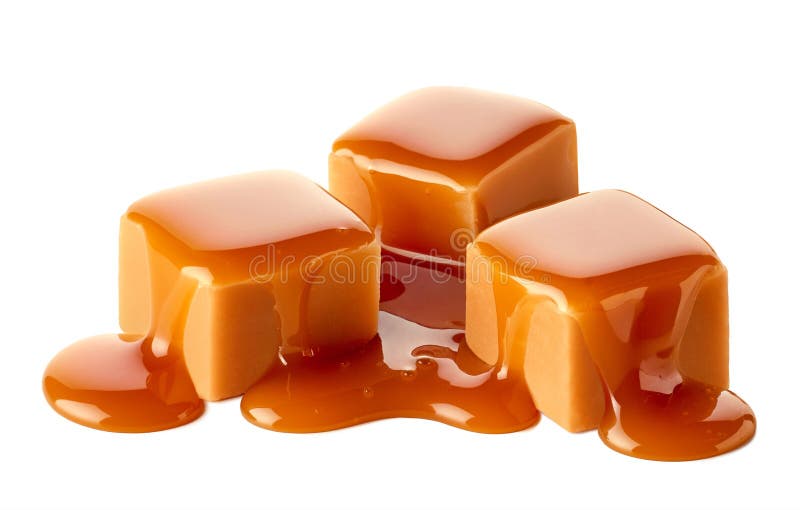 Three Sweet Caramel Candy Cubes Topped with Caramel Sauce on White ...