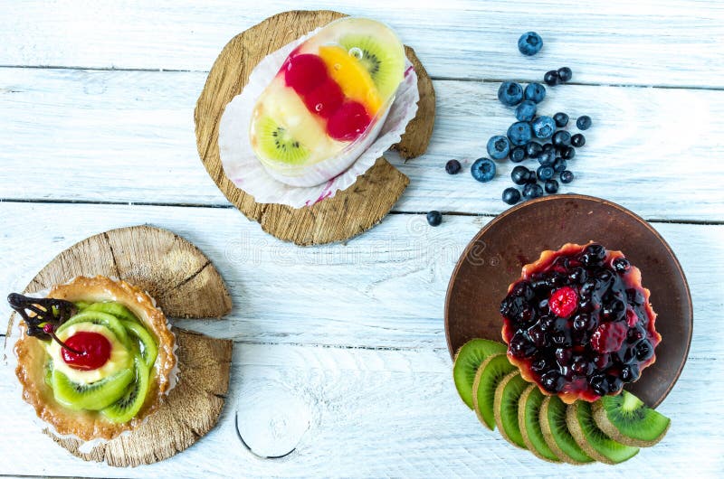 Three Sweet Pastries with Fresh Wild Berries. Stock Image - Image of ...
