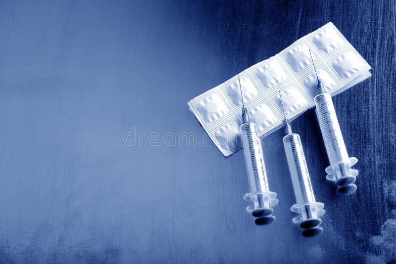 Three Syringes in Blue Monochrome Stock Photo - Image of illness, nurse ...