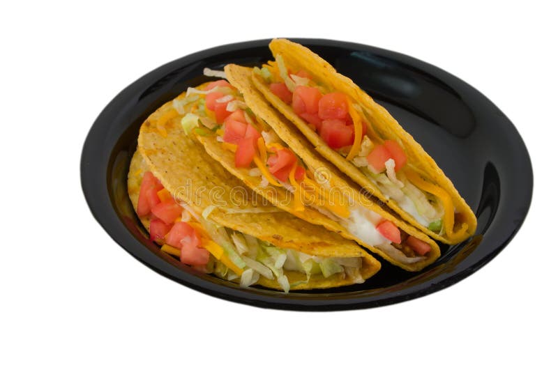 Three tacos on black plate stock image. Image of white - 4471757