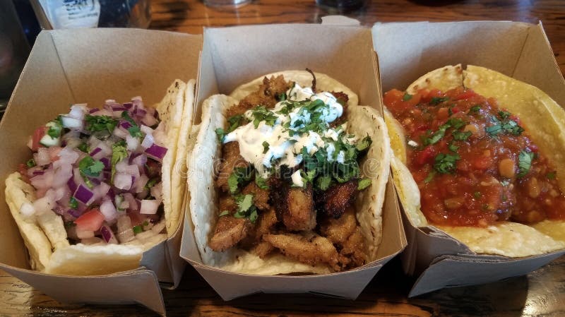 Three Tacos in Cardboard Containers Stock Image - Image of closeup ...