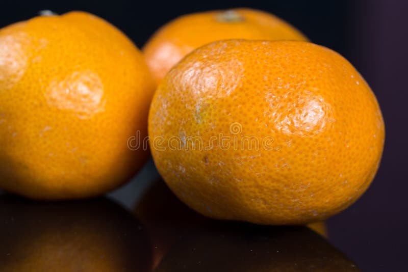 Three Tangerines Over Black Background Stock Image - Image of orange ...