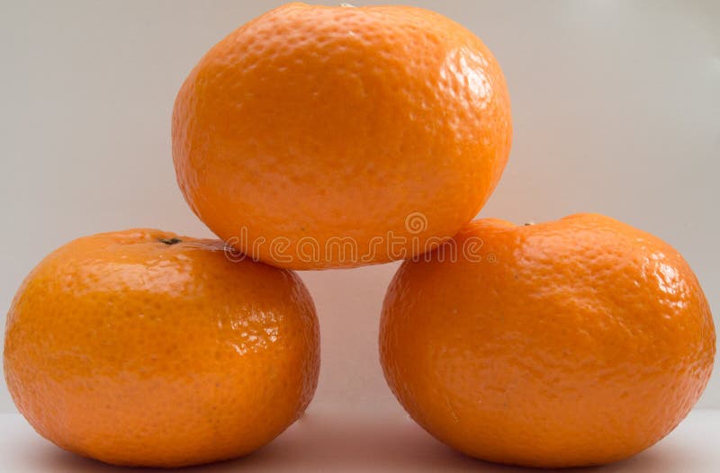 Three Tangerines Podium on White Background Stock Image - Image of ...