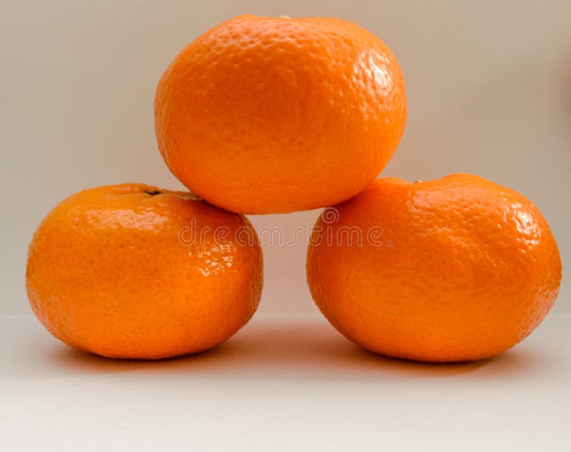 Three Tangerines Podium on White Background Stock Image - Image of ...