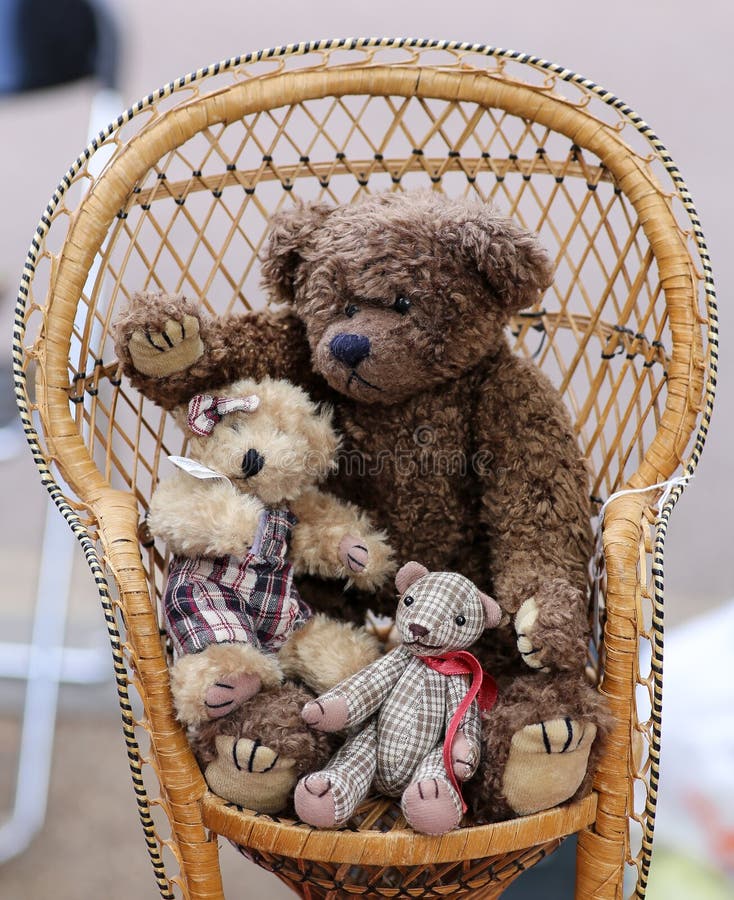Three Teddy Bears on Chair stock image. Image of cute - 33264073
