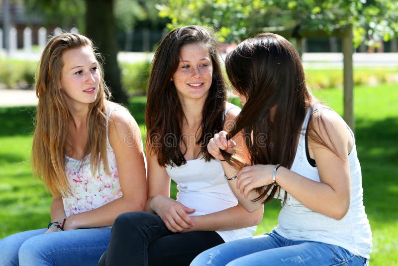 Three Teenage Girls Talking Stock Image - Image of talk, women: 48947751
