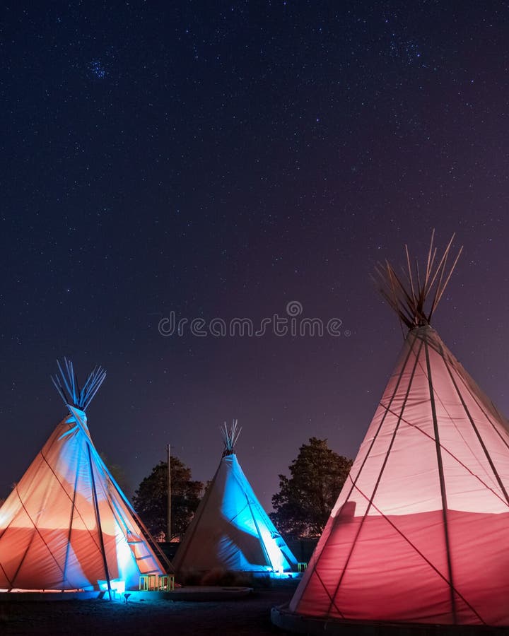 Teepees Glowing Under a Starry Sky at Night in Marfa, Texas Stock Image ...