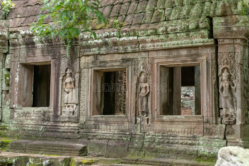 Three Temple Windows Decorated with Stone Statues Stock Photo - Image ...