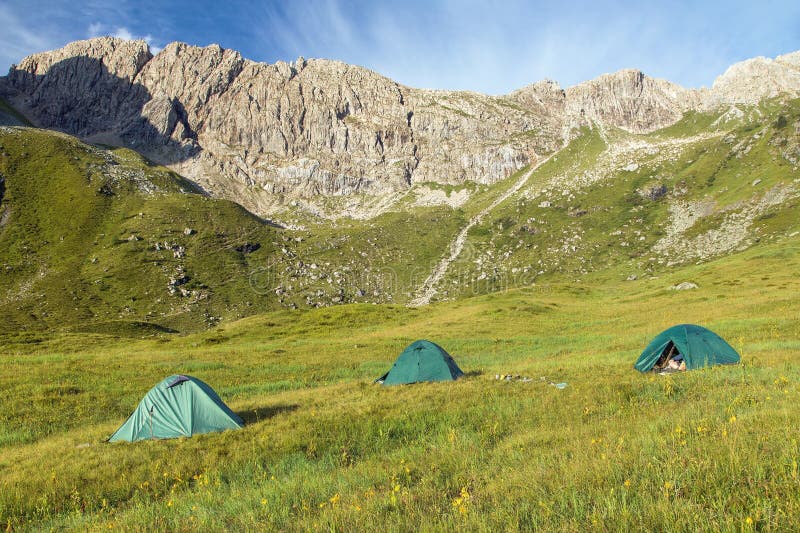 Three Tents on a Meadow in the Mountains Stock Photo - Image of extreme ...