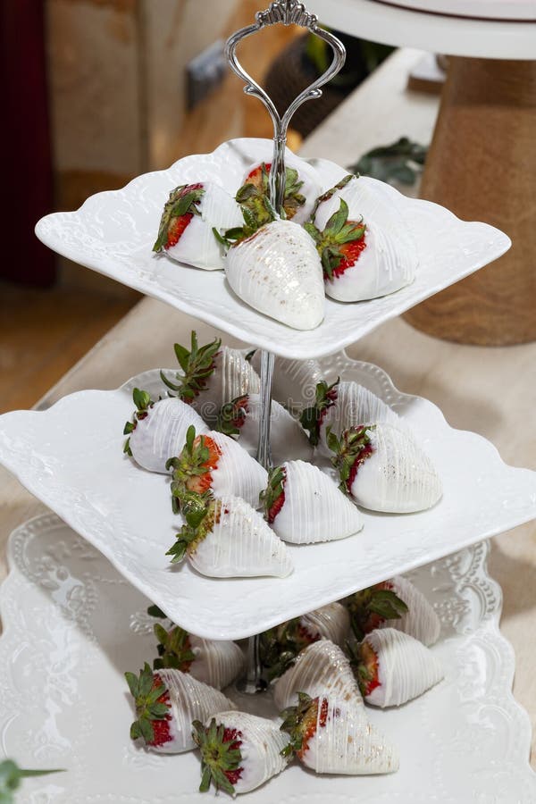 Three Tier Tray with White Chocolate Covered Strawberries Stock Photo ...