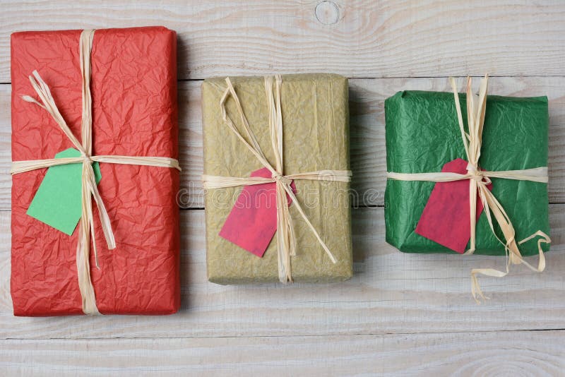Three Tissue Wrapped Presents Stock Photo - Image of crumpled, paper ...