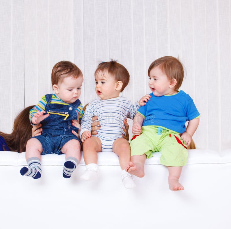 Three sad babies stock photo. Image of blubber, angry - 18007382
