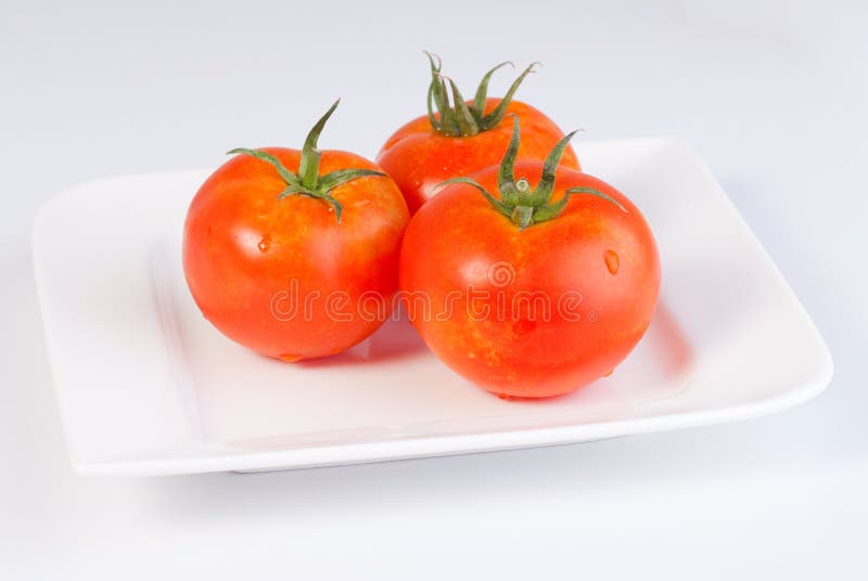 Three tomatoes stock image. Image of garden, bright, produce - 12506127