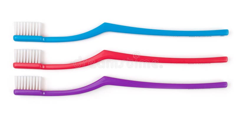 Three toothbrushes stock image. Image of rainbow, healthcare - 19566355