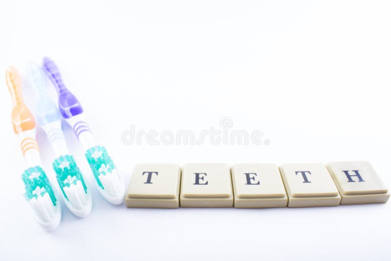 Word teeth on wooden dice stock photo. Image of cube - 122956896