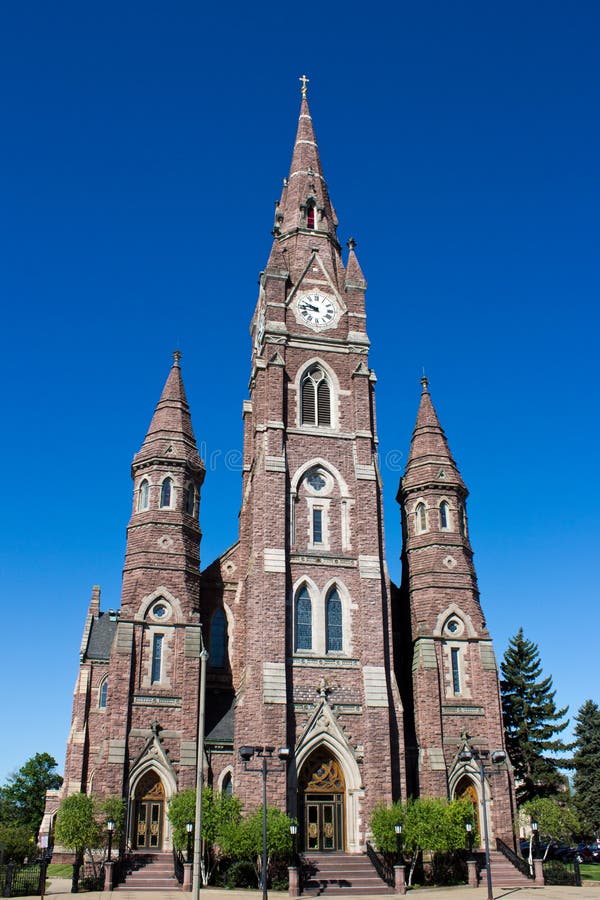 Three Tower Red Stone Cathedral Stock Image - Image of green, stone ...