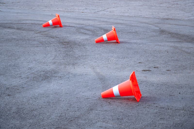 Three a Traffic Cone Tipped Over on Pavement Stock Photo - Image of ...