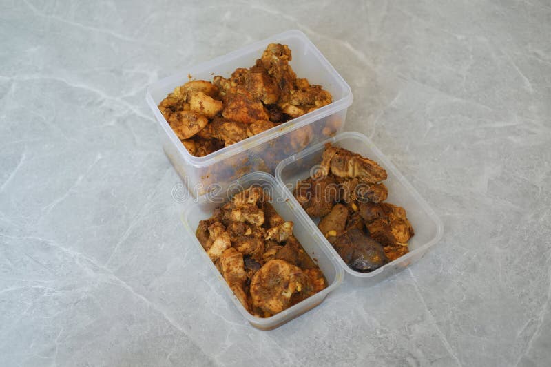Three Transparent Plastic Containers Filled with Cooked, Seasoned Meat ...