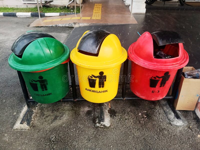 Three Trash Cans of Different Colors Stock Photo - Image of colorful ...