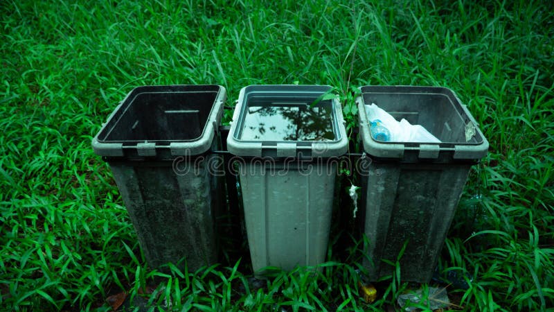 Three trash cans stock image. Image of reusing, container - 300753149