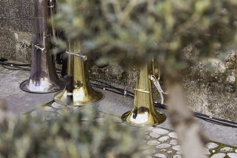 Three Trombones Placed Behind a Tree Stock Photo - Image of trombone ...