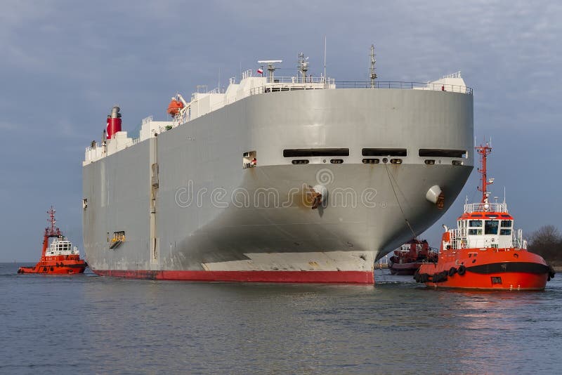 Three Tugs and the Great Ship Stock Photo - Image of industry ...