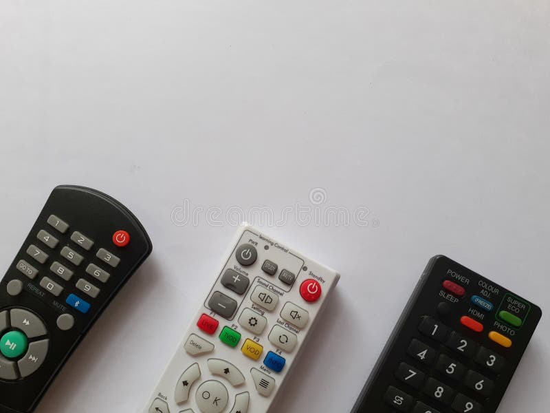 Three Tv Remote in White Background Stock Photo - Image of channel ...