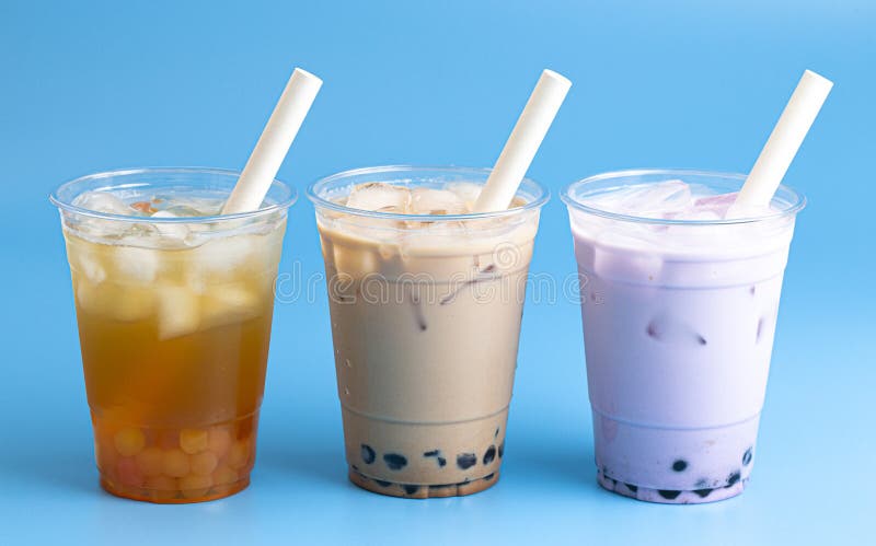 Three Different Types of Boba Tea on a Bright Blue Background Stock ...