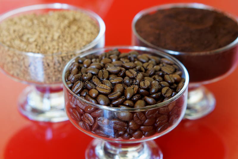 Three Types of Coffee in Glass Bowls on a Red Background: Roasted Beans ...