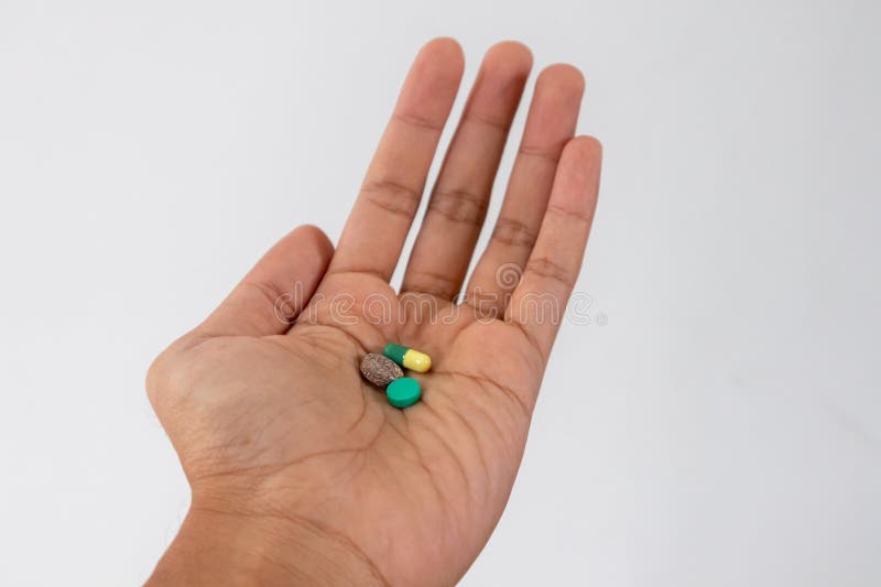 Three Types of Medicine in the Palm of the Hand Stock Photo - Image of ...