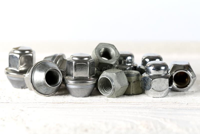 Three types of wheel nuts stock image. Image of machine - 108957693