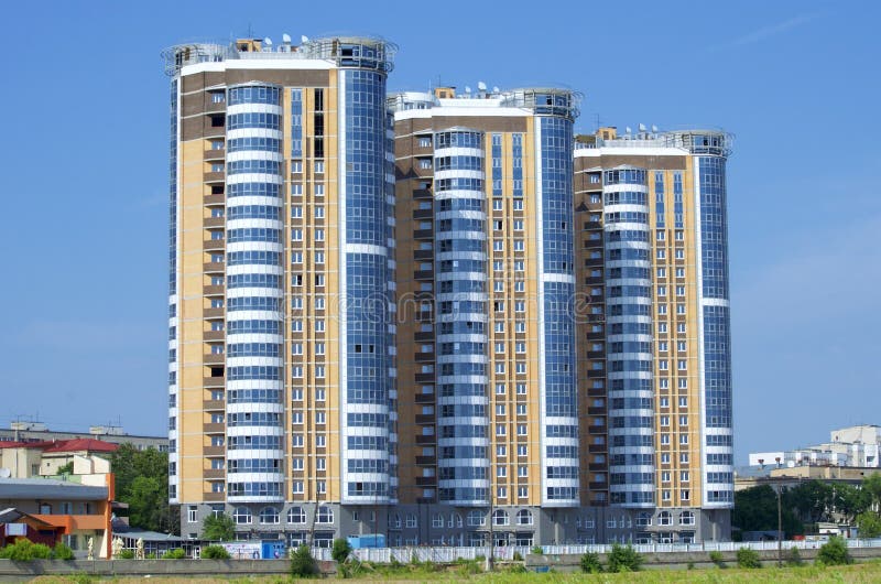 Three urban buildings stock photo. Image of trees, windows - 74139242