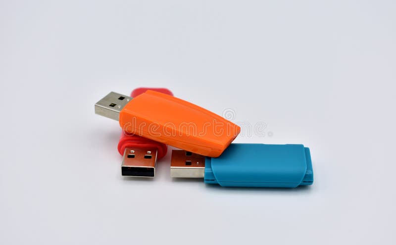 USB Flash Memory Drives with Colours, Orange, Blue and Red, on a White ...